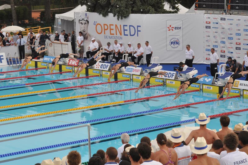 Swimmers Diving into Swimming Pool Editorial Stock Photo - Image of ...