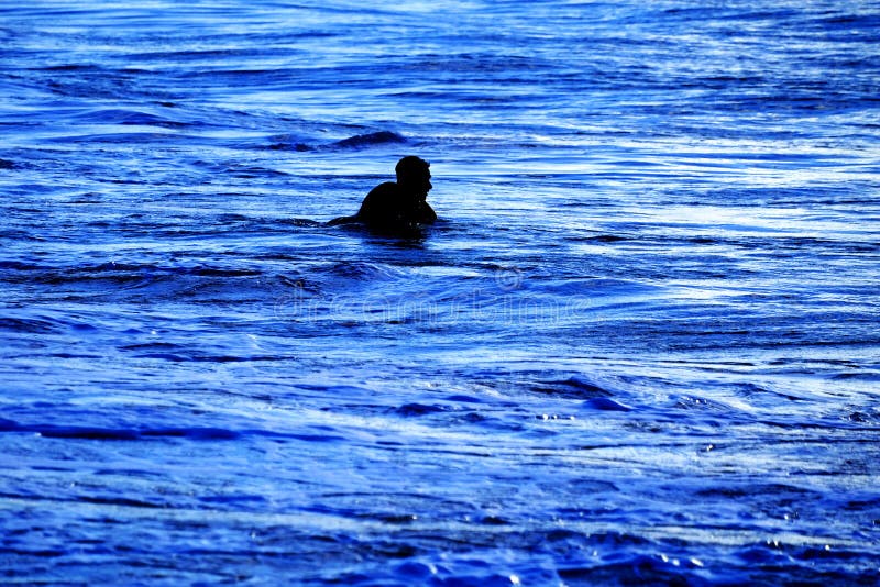 Swimming in Ocean Surf and Waves Editorial Photography - Image of board ...