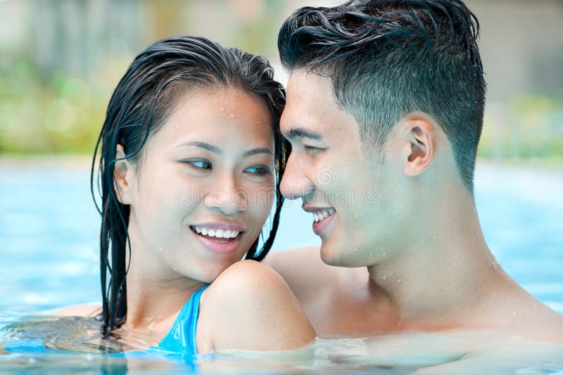 Romantic Couple in Swimming Pool Stock Photo - Image of refreshment ...