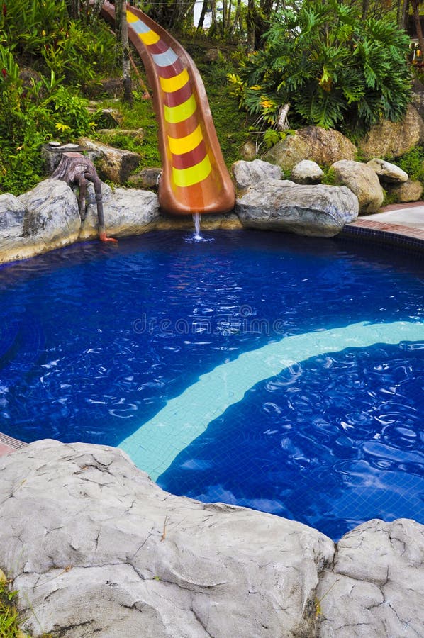 Rock Style Swimming Pool stock image. Image of lifestyle - 9369209