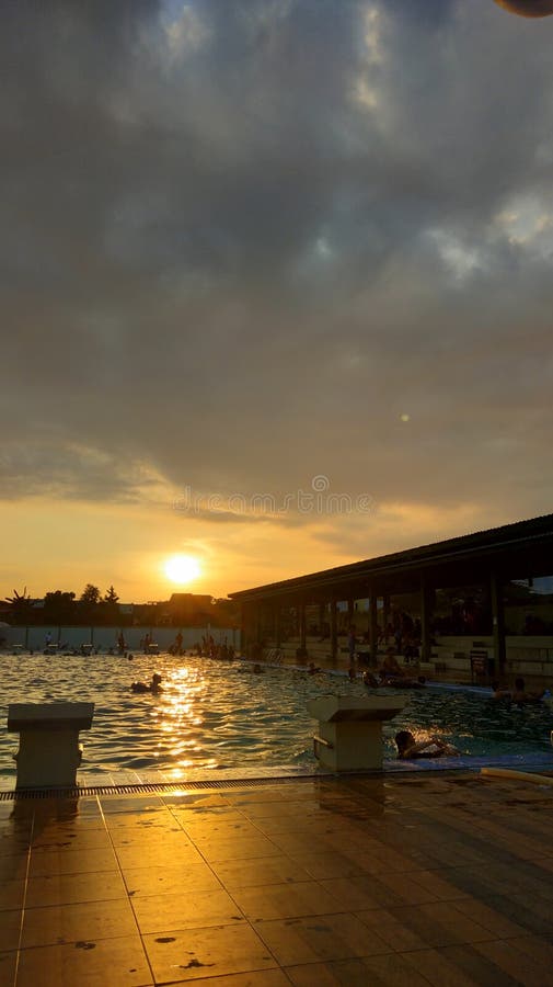 Swimming Pool in the Afternoon Stock Photo - Image of pool, sunset ...