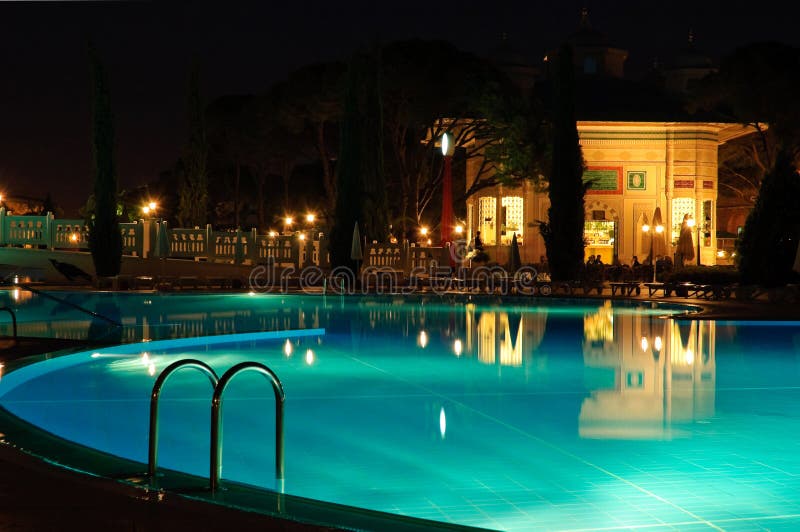Swimming Pool Area At Night Stock Photo - Image of refreshing, canary ...