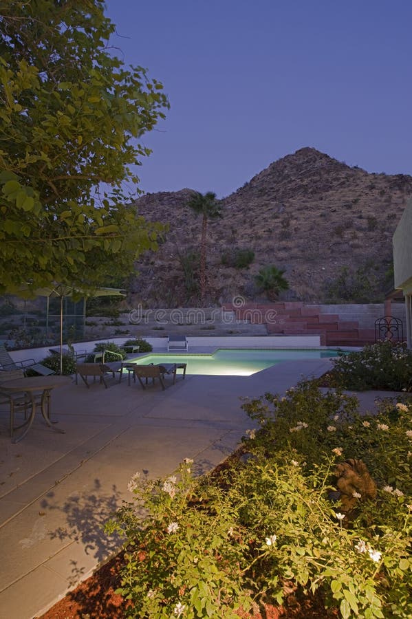 Swimming Pool in the Backyard Stock Image - Image of poolside ...