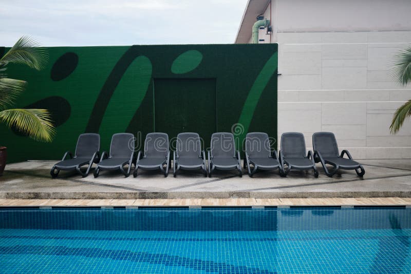 Swimming Pool Bench at the Swimming Pool Deck Stock Photo - Image of ...