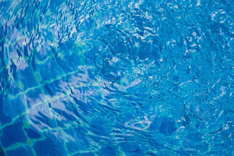 Blue Ripped Water in Swimming Pool Stock Photo - Image of gravel, blue ...