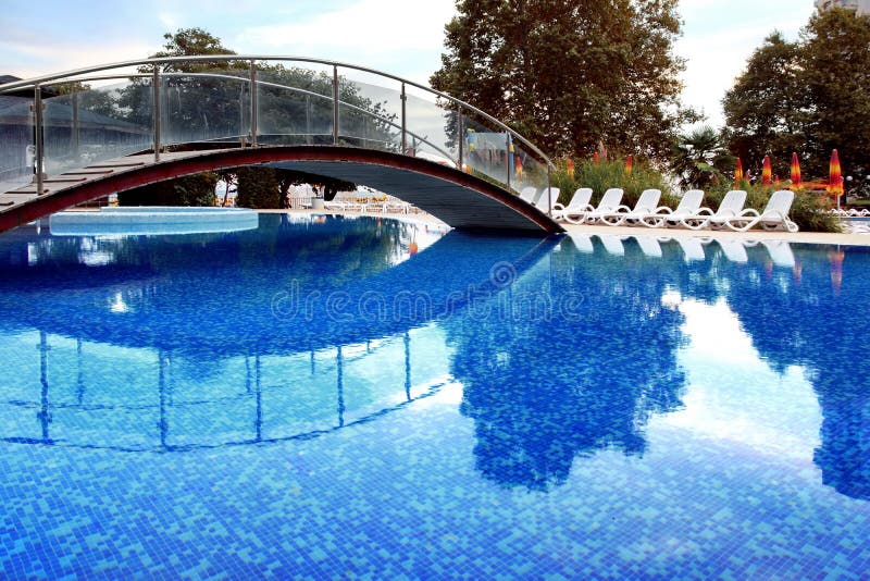 Swimming Pool with Bridge stock image. Image of pool - 46747303