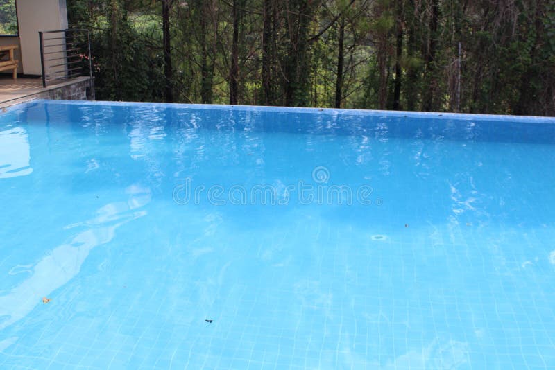 A Swimming Pool on a Bright Day Stock Photo - Image of backyard, resort ...