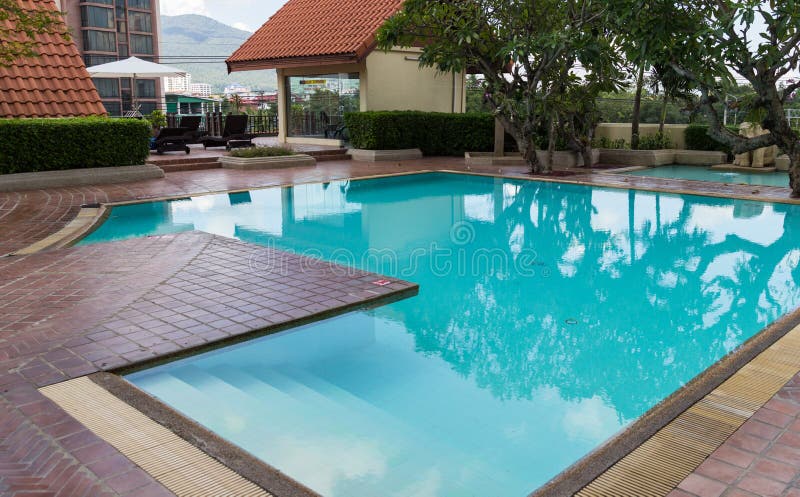 Swimming Pool on the Building Stock Photo - Image of garden, poolside ...