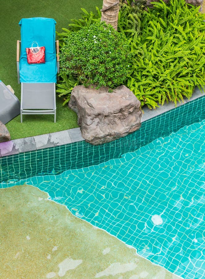 Swimming pool chair. stock image. Image of grass, back - 55361489