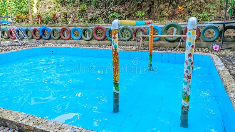 Swimming Pool with Clear Water. There is a Shower Inside Stock Photo - Image of inside, water ...
