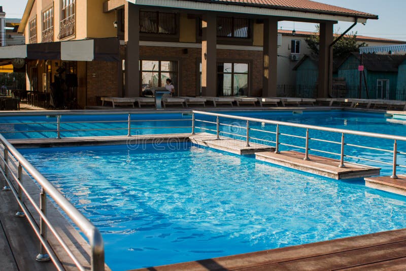 Swimming Pool in a Complex with Blue Water Stock Image - Image of blue ...