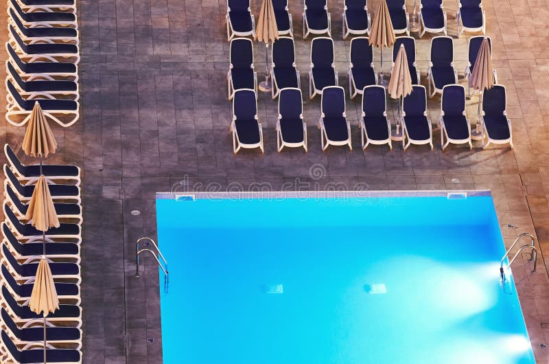 Swimming Pool and Deck Chairs at Night Stock Photo - Image of summer ...