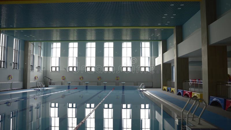 Pool Filled with Clear Water Reflecting Light from Windows Stock Video ...