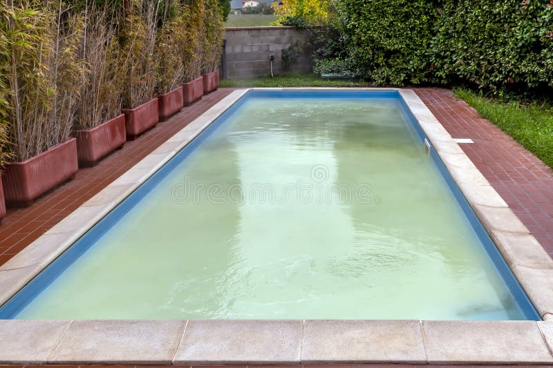 A Swimming Pool Has White Water Due To Shock Chlorination Stock Photo ...