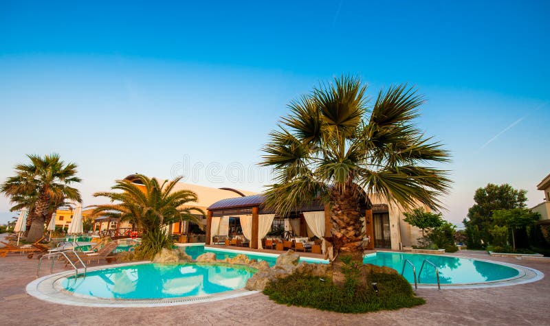 Swimming Pool in a Holiday Resort Stock Photo - Image of ladder ...