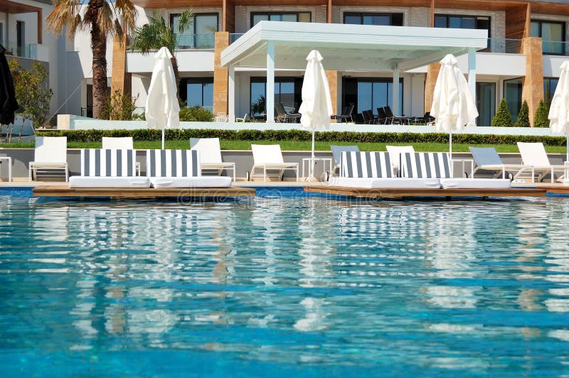 Swimming Pool with Jacuzzi by Beach at the Modern Luxury Hotel Stock ...