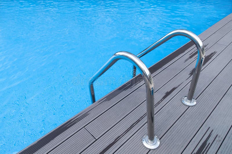 Swimming Pool Ladder stock photo. Image of indoors, water - 36129422