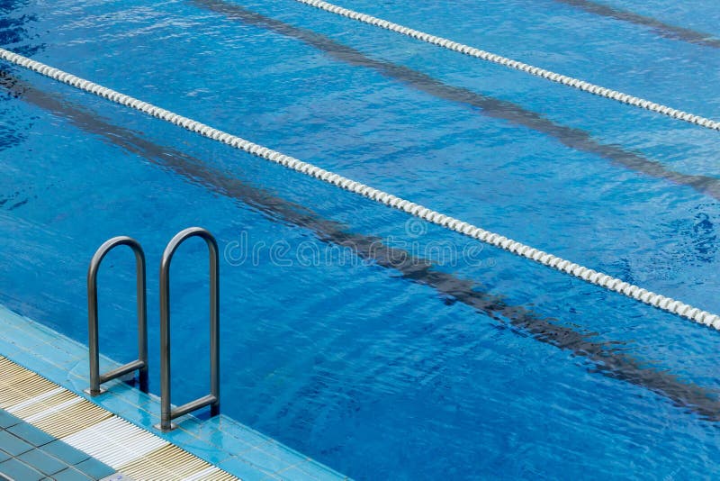 Swimming Pool Ladder and Lane Ropes Stock Image - Image of step, cord ...