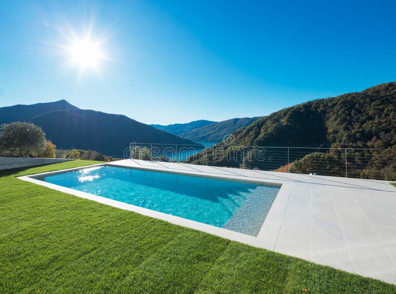 Modern Swimming Pool with Lake and Valley View Stock Image - Image of ...