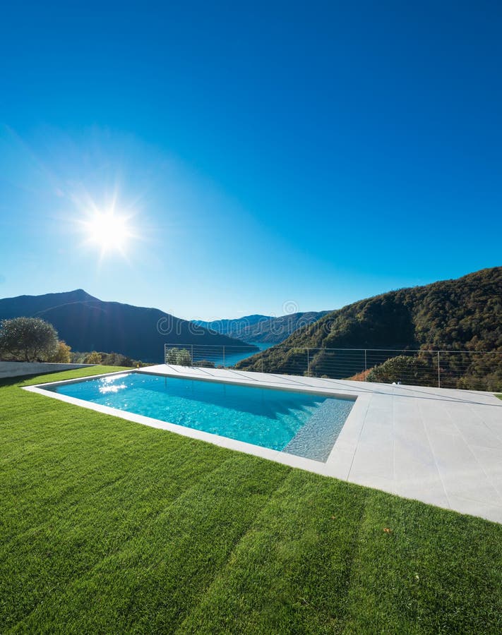 Modern Swimming Pool with Lake and Valley View Stock Image - Image of ...