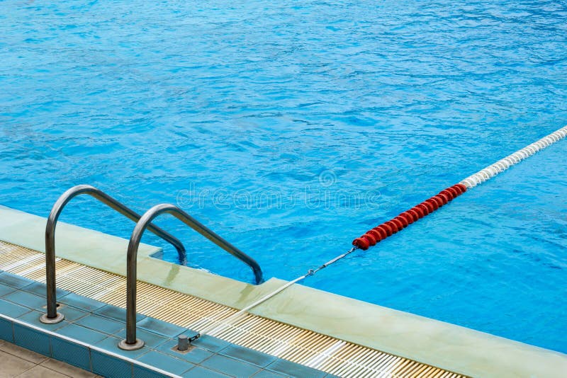 Swimming Pool with a Lane Rope and a Ladder Stock Photo - Image of ...