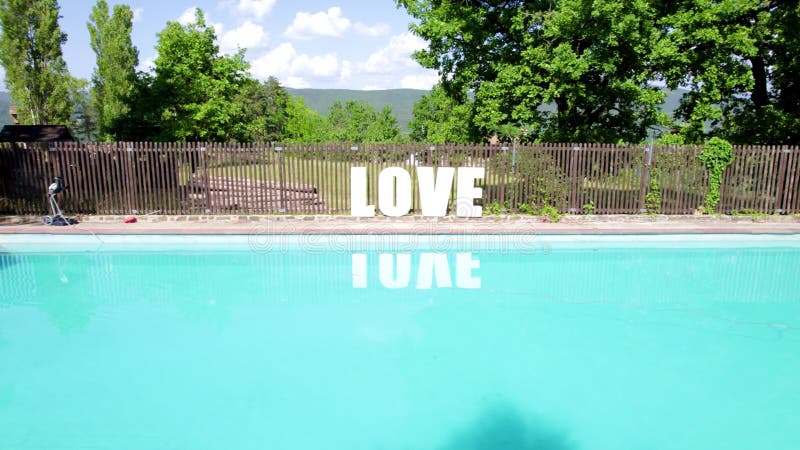 I LOVE YOU Inscription from Stones in Beach, Man Stock Footage - Video ...