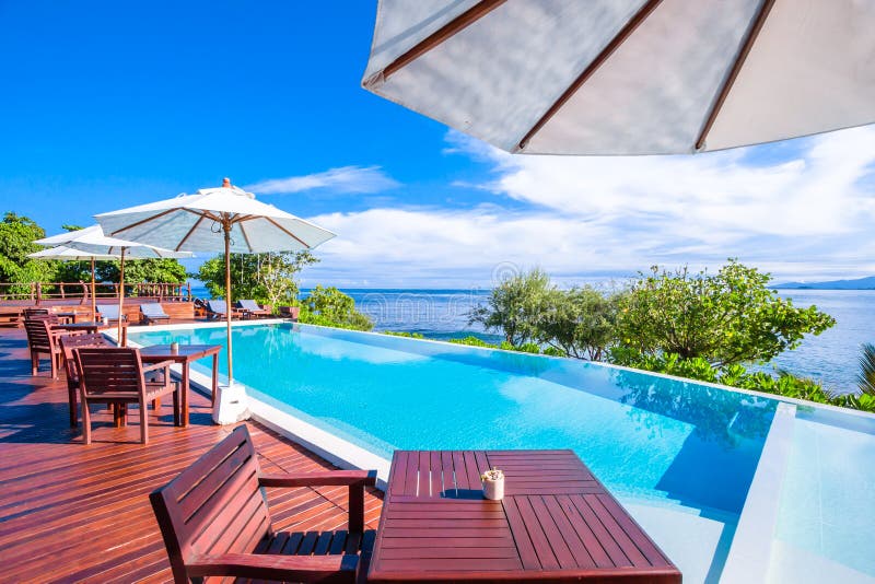 Swimming pool stock image. Image of sunlight, palm, blue - 72328699