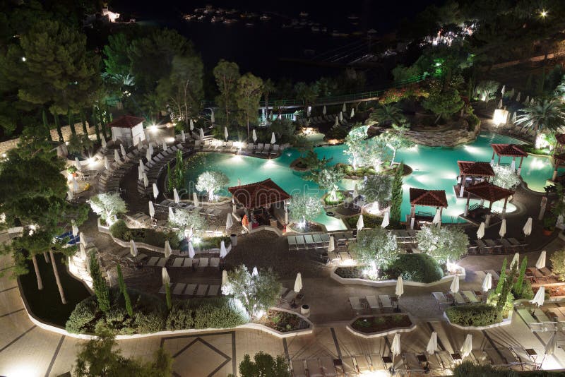 Swimming pool at night stock image. Image of palm, paradise - 25939959
