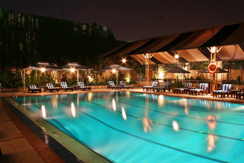Swimming Pool at Night stock photo. Image of relax, roof - 3688644