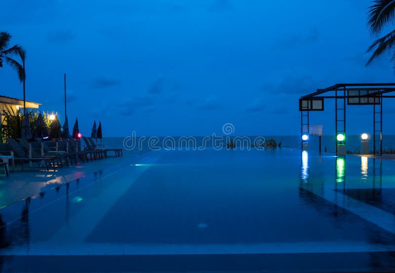 The swimming pool at night stock photo. Image of illuminated - 78320450