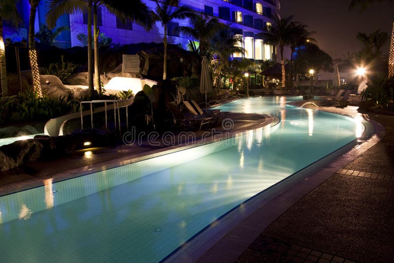 Swimming Pools at Night stock photo. Image of luxury, water - 5011854