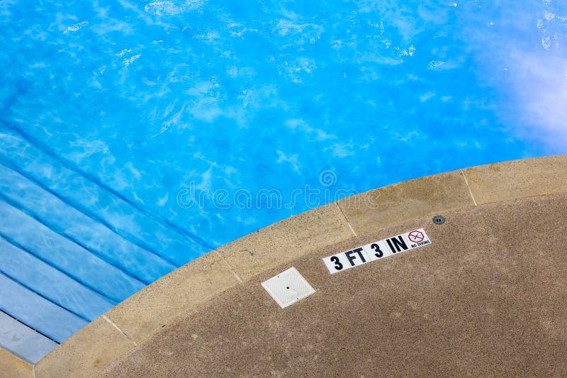 Swimming Pool with No Diving Warning Sign and 3 Ft Depth Marker Stock ...