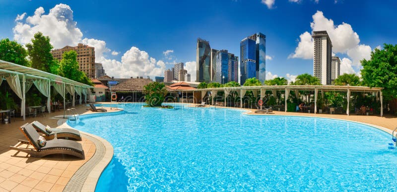 Swimming pool at noon stock photo. Image of cambodia - 237119242