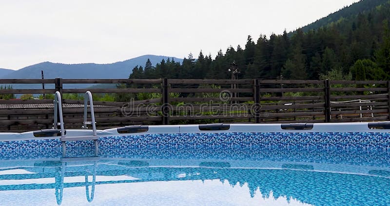 Swimming Pool Overlooking the Mountains. Panoramic View of the Pool ...