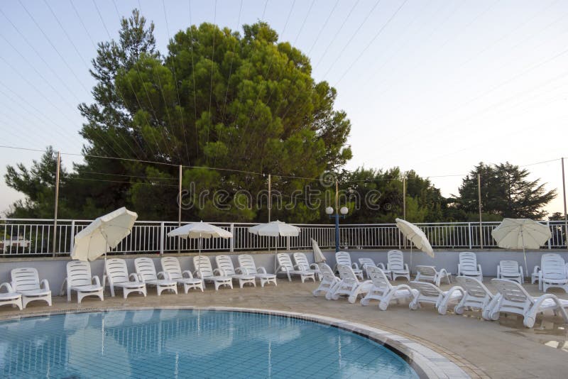 Swimming Pool in the Rays of the Setting Sun Stock Image - Image of ...