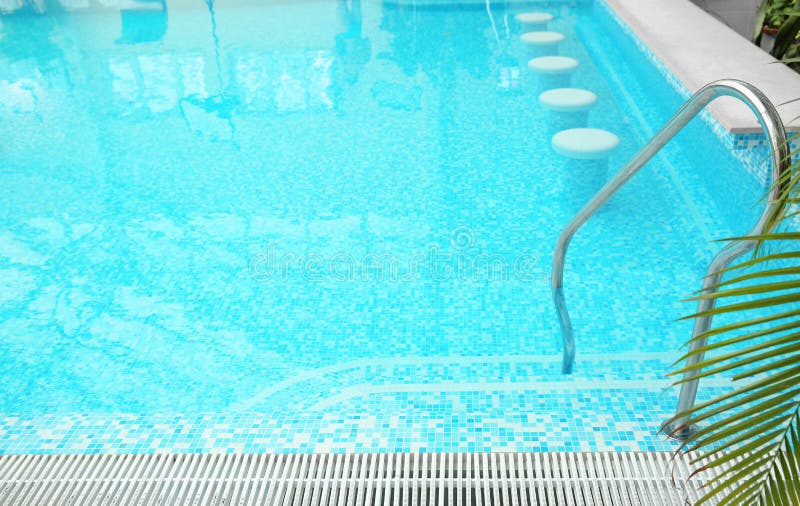 Swimming Pool with Refreshing Blue Water. Stock Photo - Image of ...