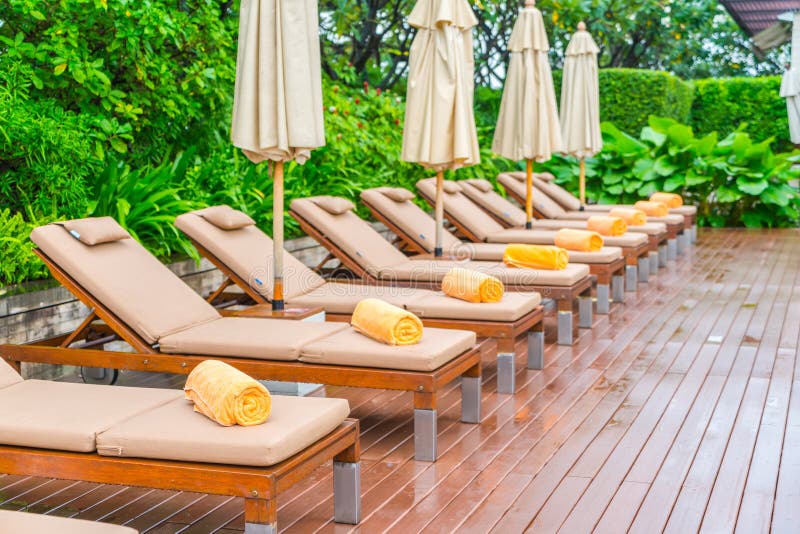 Swimming Pool with Relaxing Seats . Stock Photo - Image of blue ...