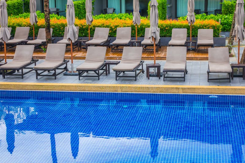 Swimming Pool with Relaxing Seats Near the Sea . Stock Image - Image of ...