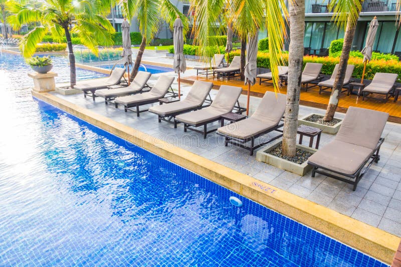 Swimming Pool with Relaxing Seats Near the Sea . Stock Photo - Image of ...