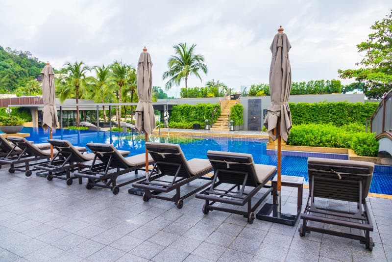 Swimming Pool with Relaxing Seats Near the Sea . Stock Image - Image of ...