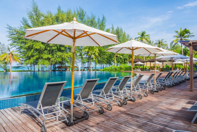 Swimming Pool with Relaxing Seats Near the Sea . Stock Photo - Image of ...