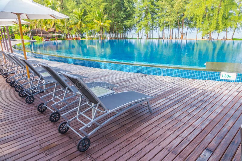 Swimming Pool with Relaxing Seats Near the Sea . Stock Image - Image of ...