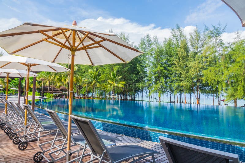 Swimming Pool with Relaxing Seats Near the Sea . Stock Image - Image of ...