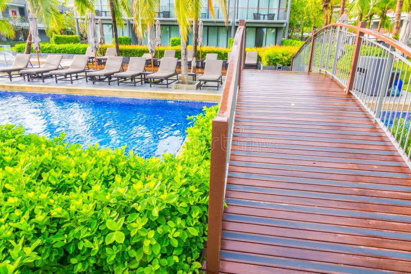 Swimming Pool with Relaxing Seats Near the Sea . Stock Photo - Image of ...