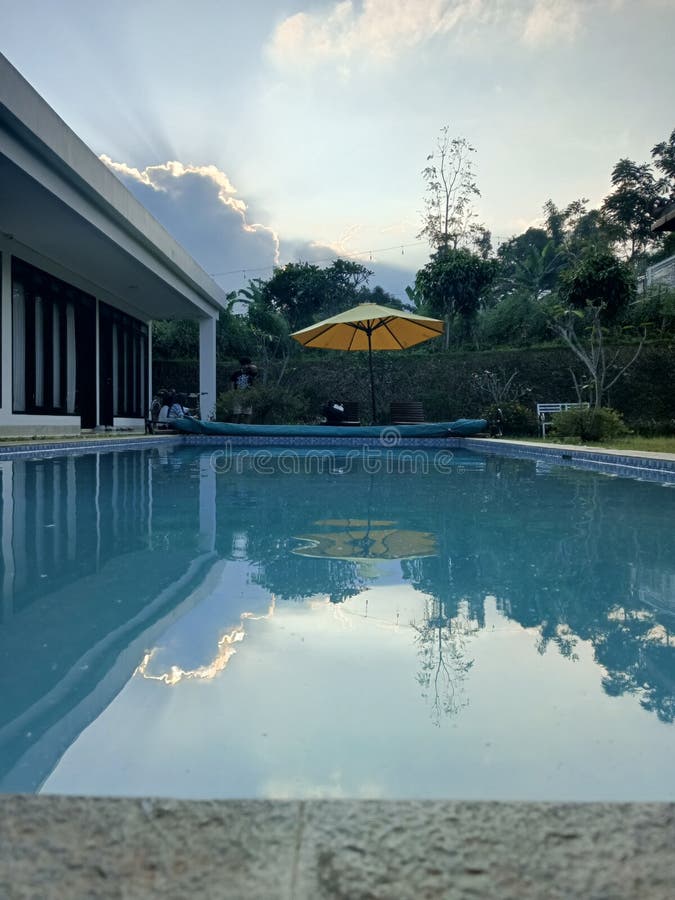 Swimming Pool at Resort during Evening Time Stock Image - Image of ...