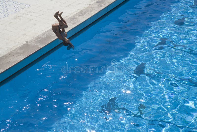 Swimming pool risky jump stock photo. Image of health - 1688116