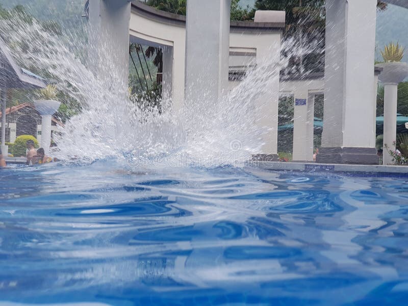 Swimming Pool at Riverside Spring Resort, Kurintar Stock Photo - Image ...