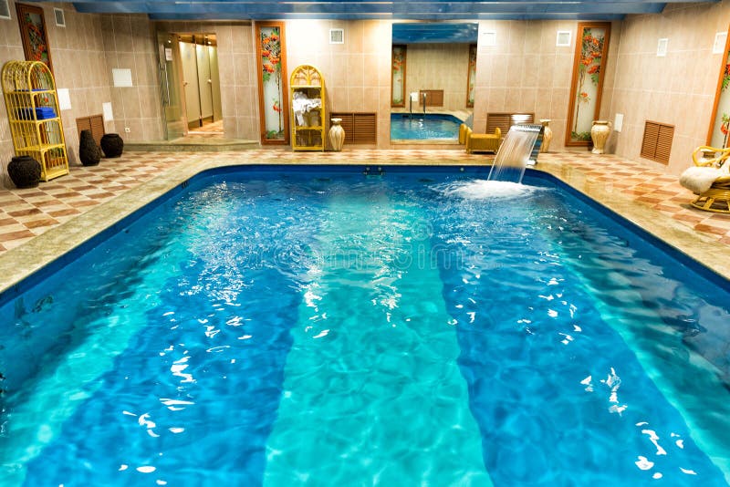 Swimming pool in sauna stock photo. Image of people - 188084418