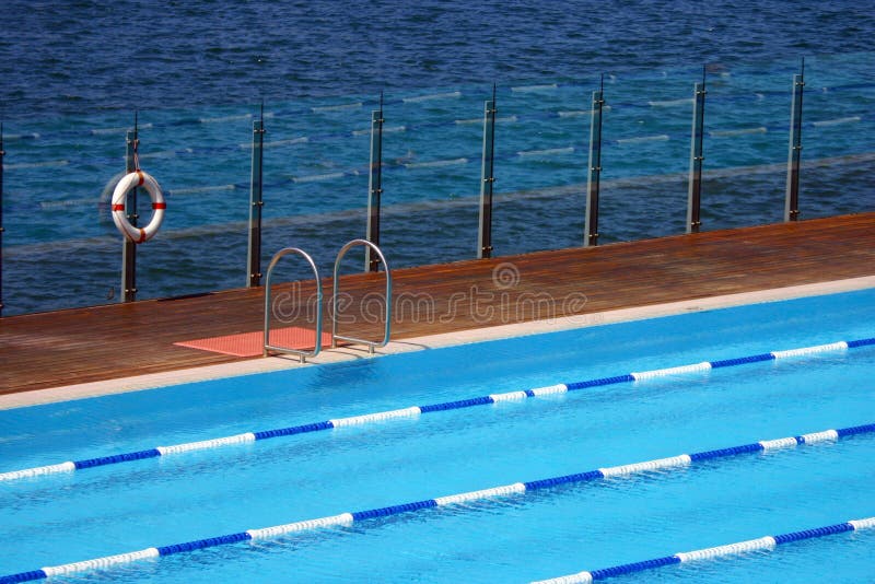 Swimming pool by the sea stock photo. Image of turquoise - 1528628