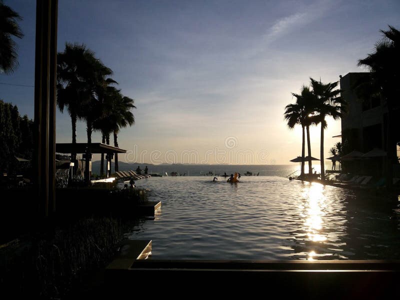 Swimming pool by the sea stock photo. Image of shore - 228606280